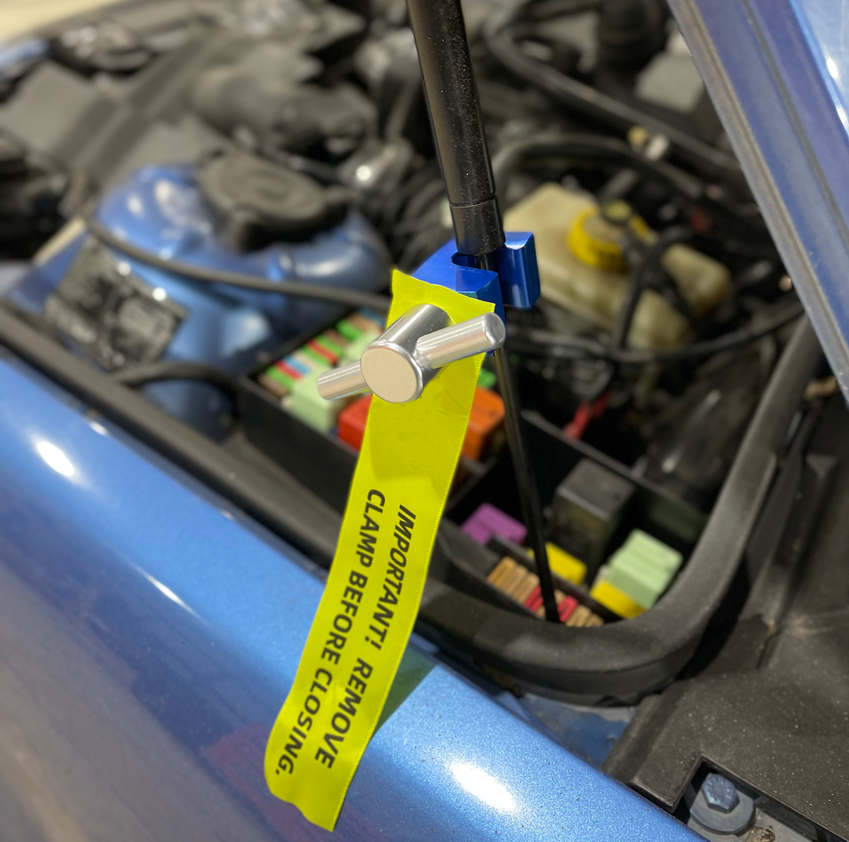 Hood Strut Clamp — Race German