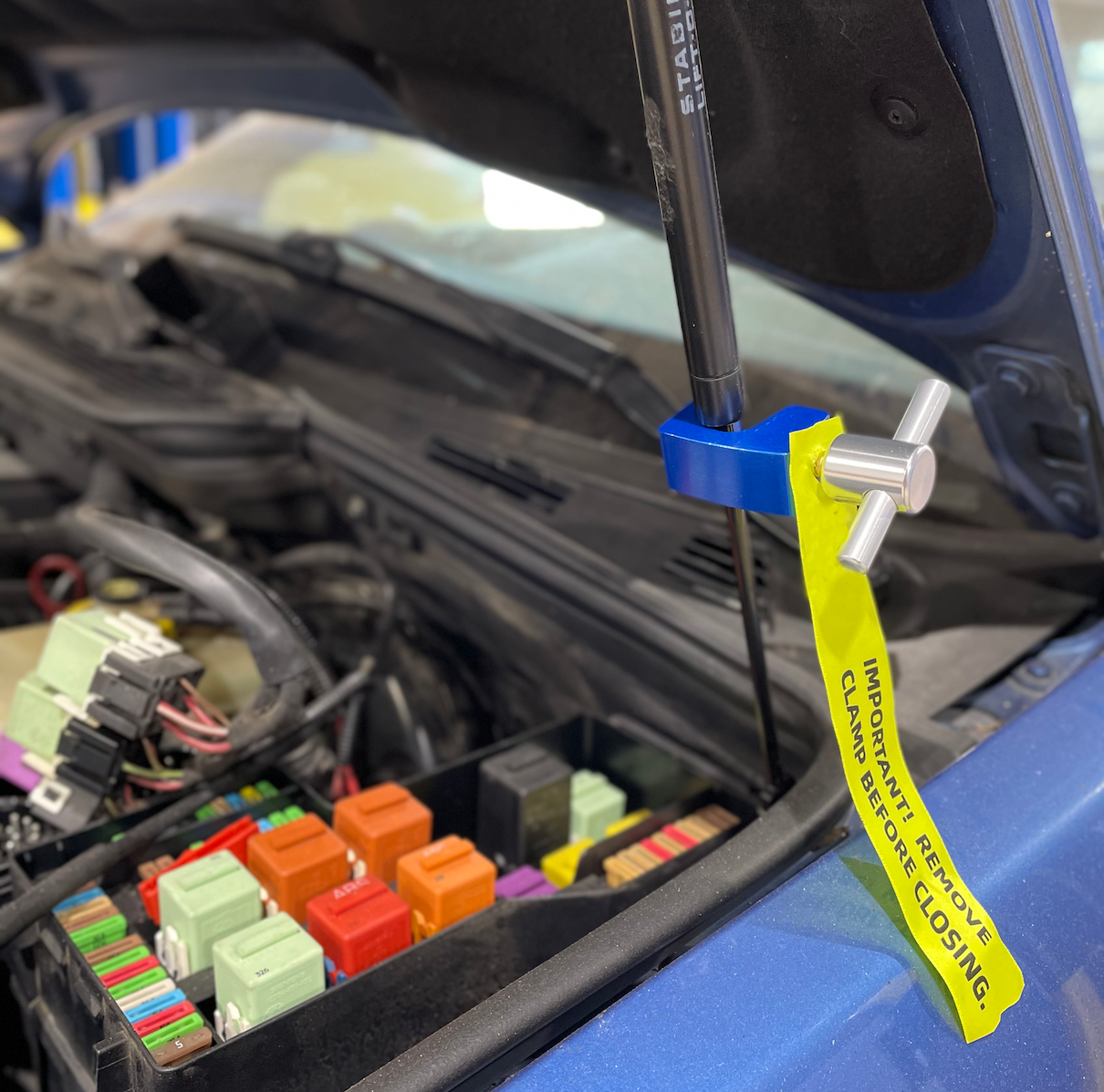 Hood Strut Clamp — Race German